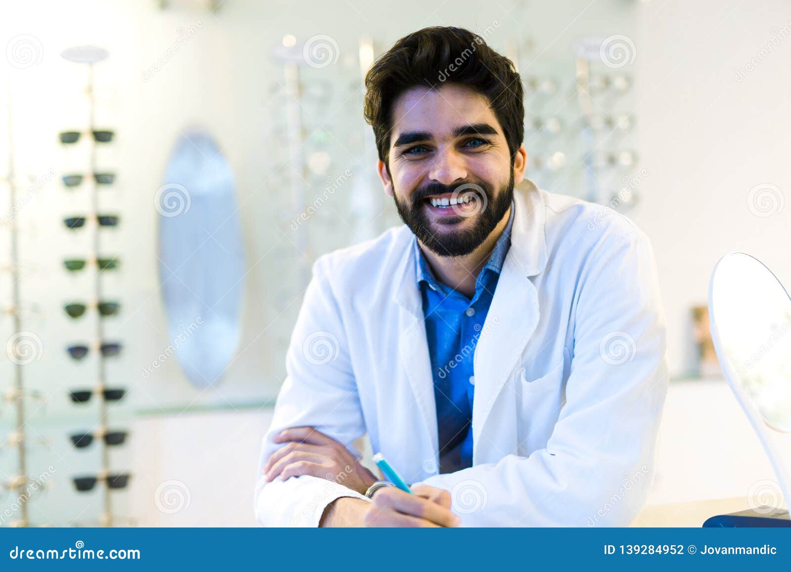 Man Optician in Coat at Optics Store Stock Photo - Image of choice ...