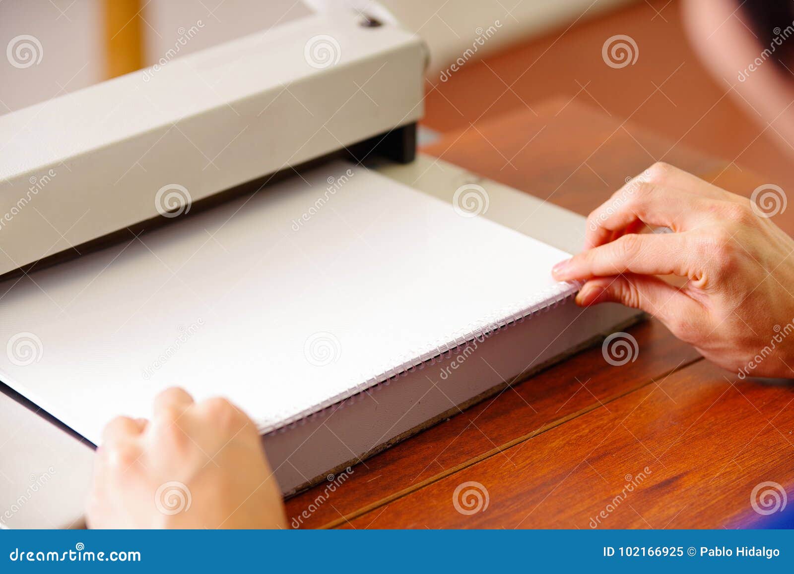 Man Organizing the Documents Using His Hands To Binding Documents Using ...