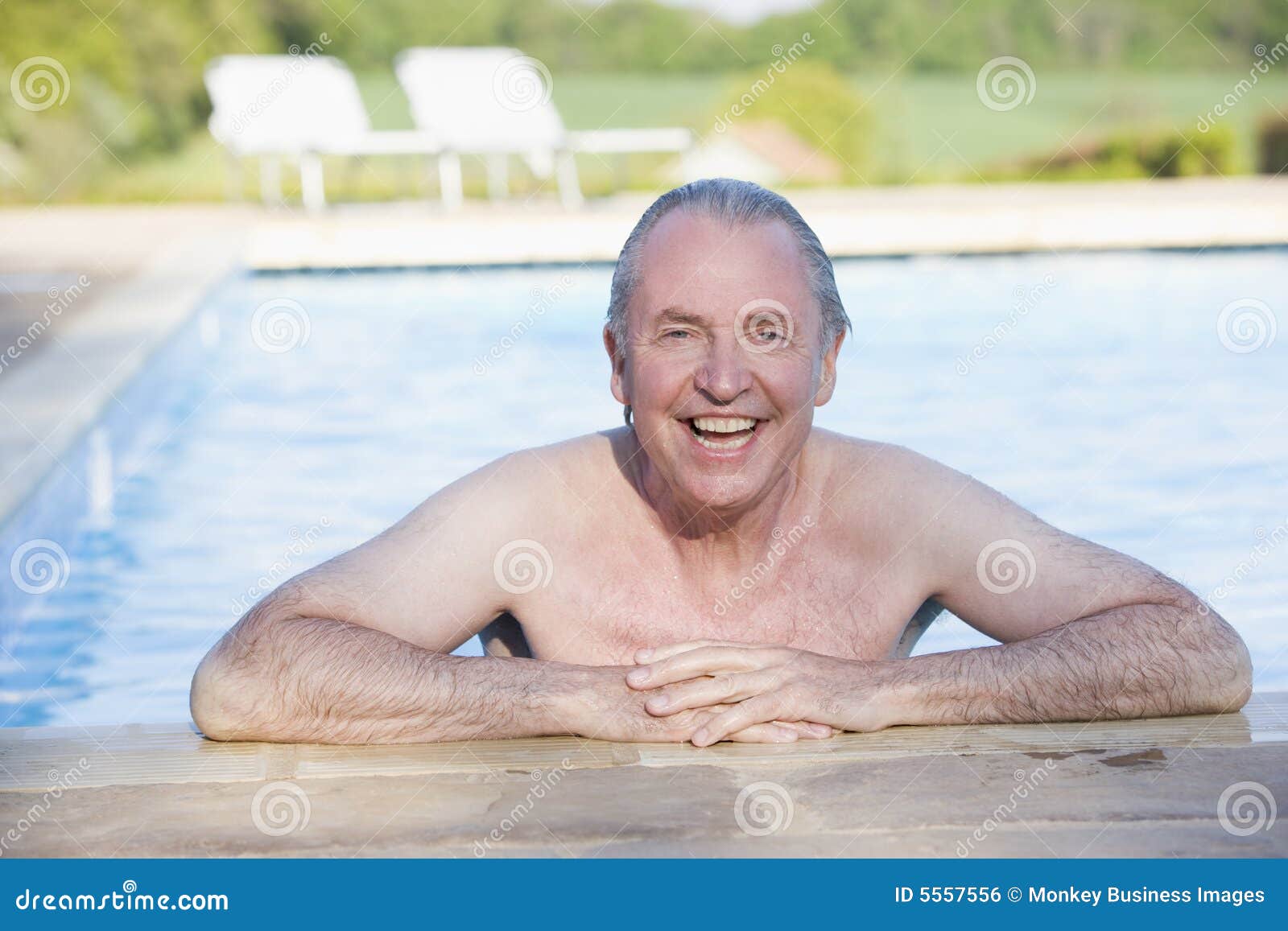 Man in Outdoor Pool Smiling Stock Photo - Image of male, relaxed: 5557556