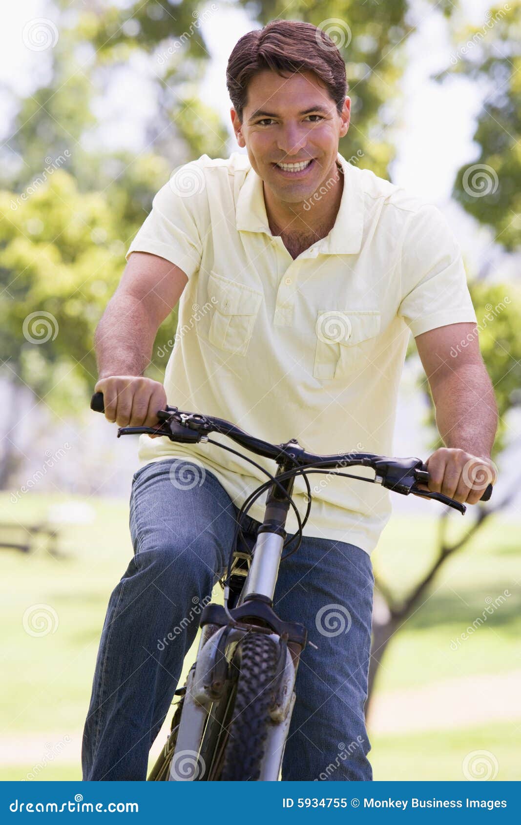 Man Outdoors on Bike Smiling Stock Image - Image of bicycle, male: 5934755