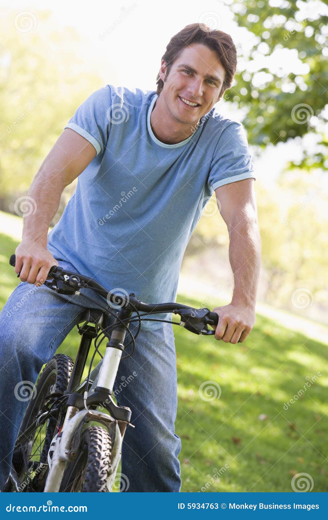 Man Outdoors on Bike Smiling Stock Image - Image of bicycle, cycle: 5934763