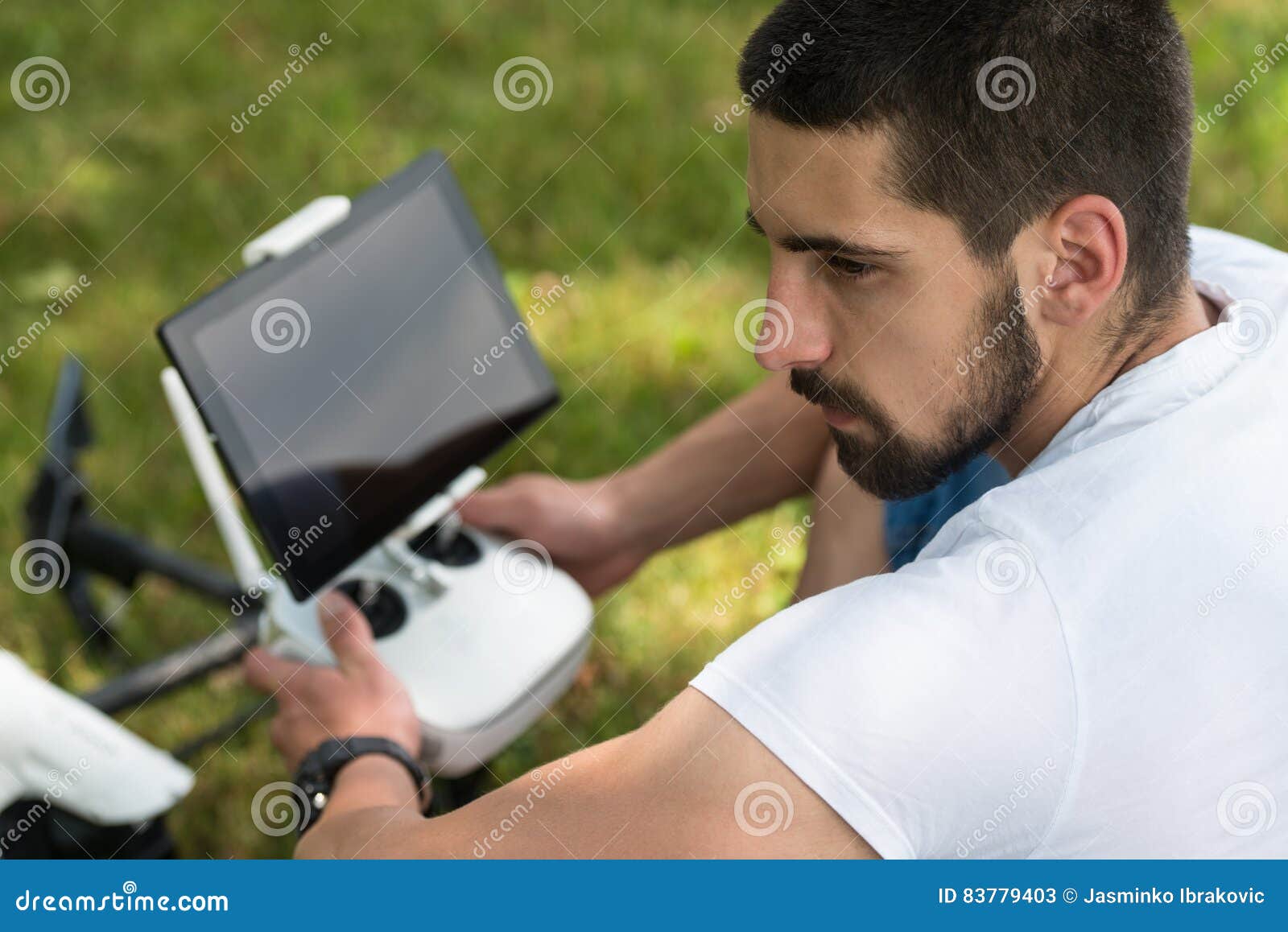 Man Outdoors with Remote Control Preparing the Drone Stock Image ...