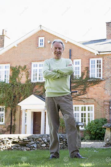 Man Outside His House stock photo. Image of adult, arms - 7876846