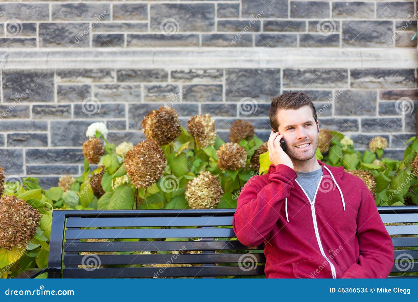 Man outside on his phone stock photo. Image of modern - 46366534