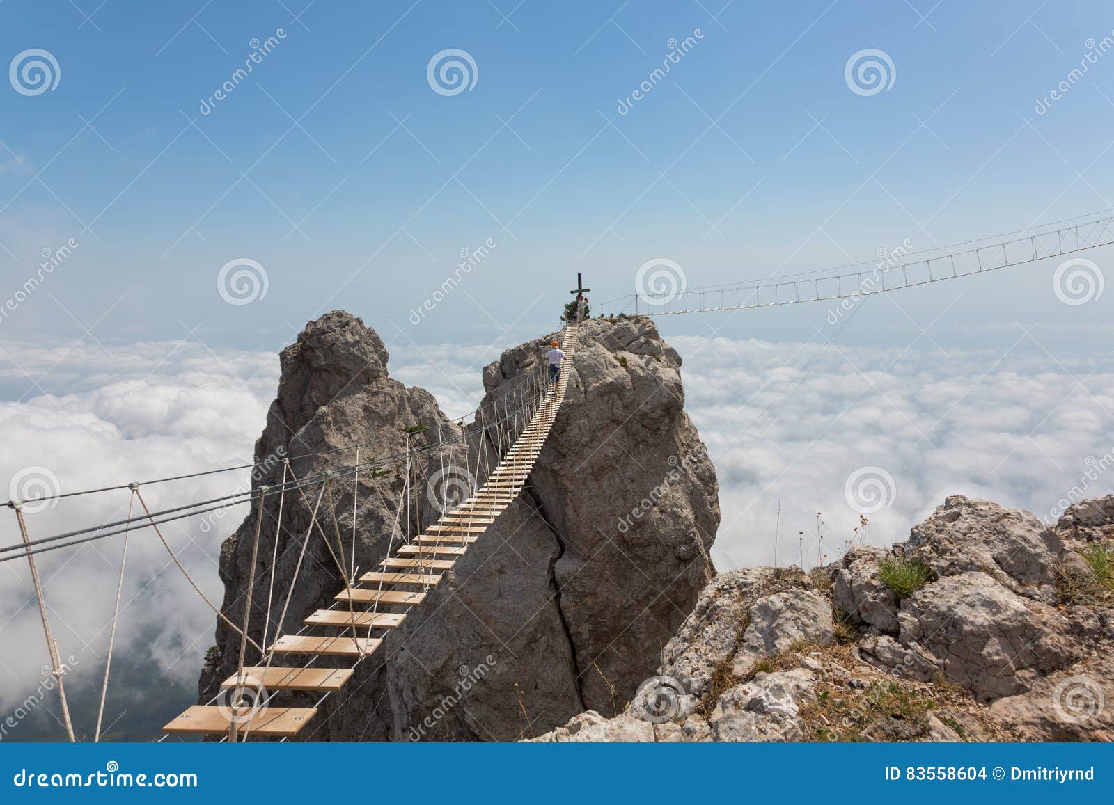 Man over chasm stock photo. Image of footbridge, extreme - 83558604