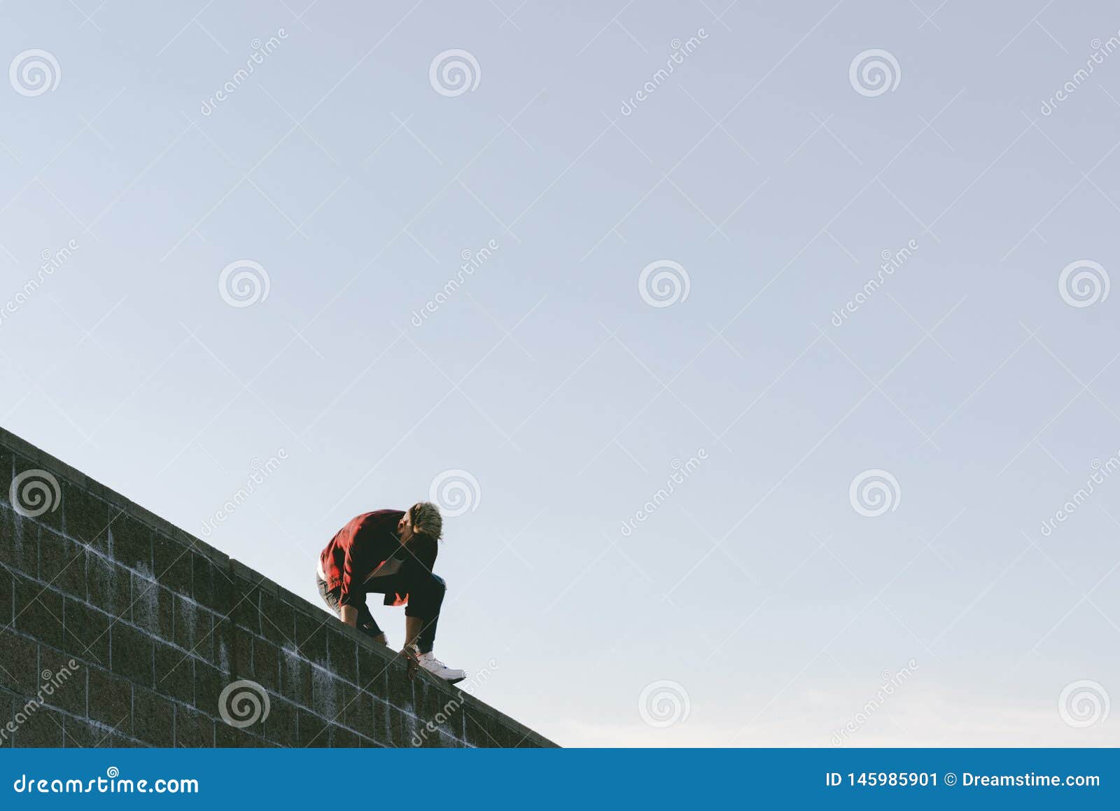 Man Over a Wall stock image. Image of material, crack - 145985901