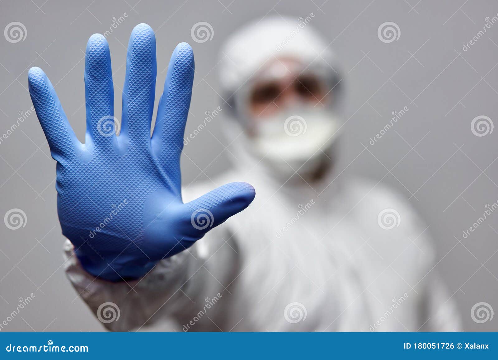Man in Overall Suit Making Stop Sign Stock Photo - Image of 2019ncov ...