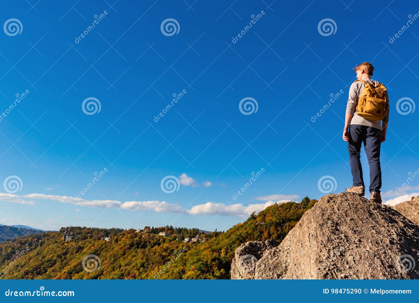 Man Overlooking the Mountains Belown Stock Photo - Image of mountain ...