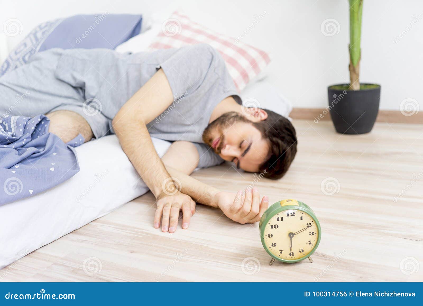 Man is overslept stock photo. Image of alarm, awake - 100314756