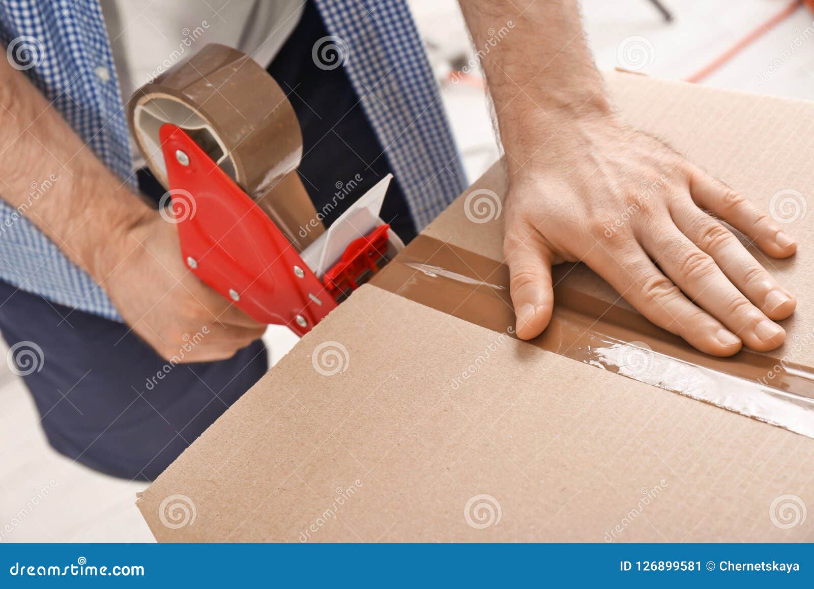 Man Packing Cardboard Box, Closeup Stock Image - Image of carton ...