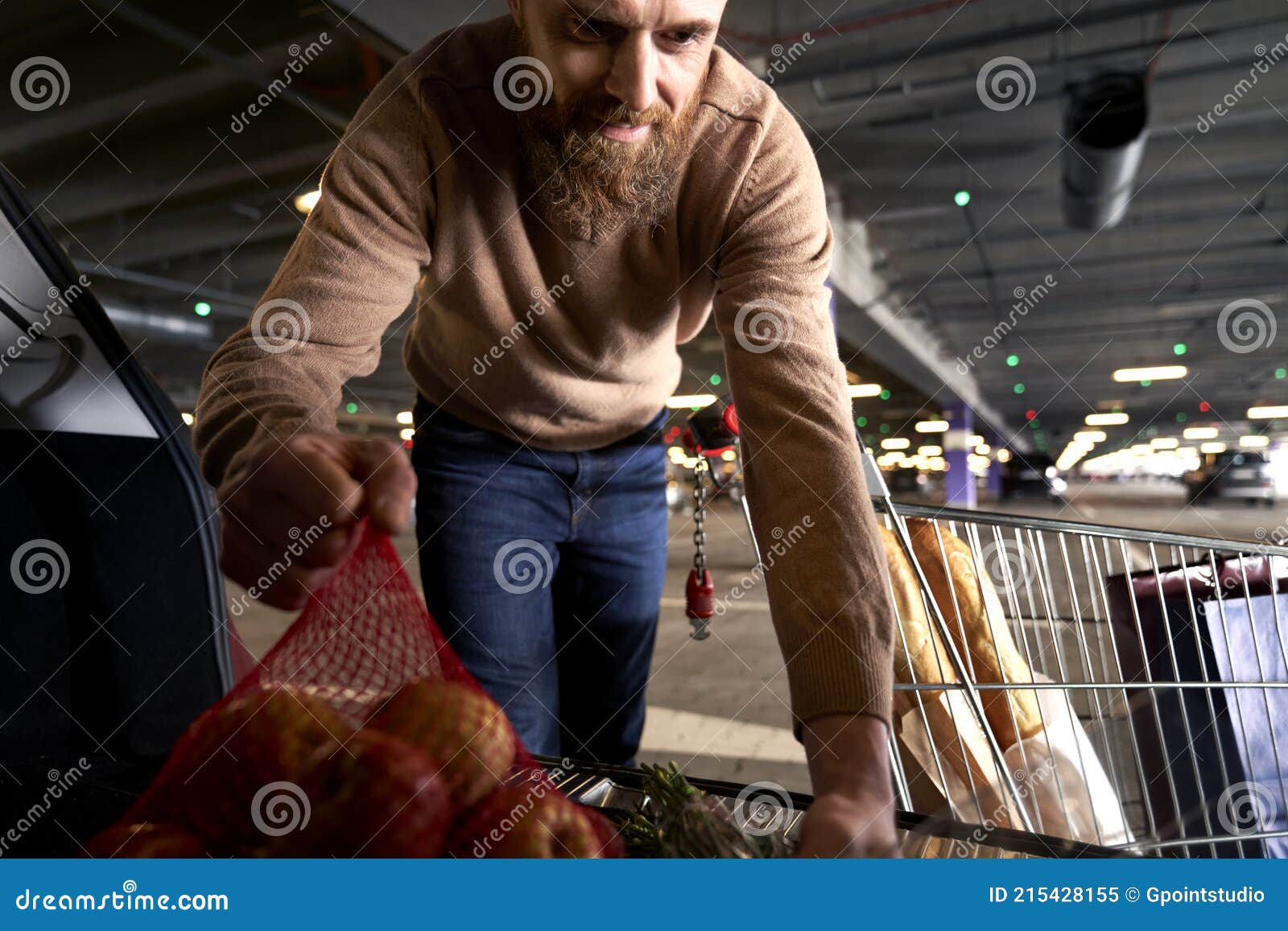 Man Packing Shopping Bags in a Car Trunk Stock Image - Image of healthy ...