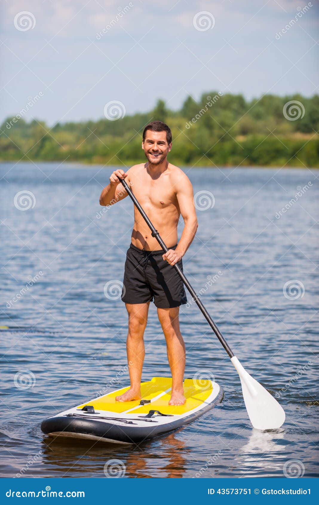 Man on paddleboard. stock image. Image of recreational - 43573751
