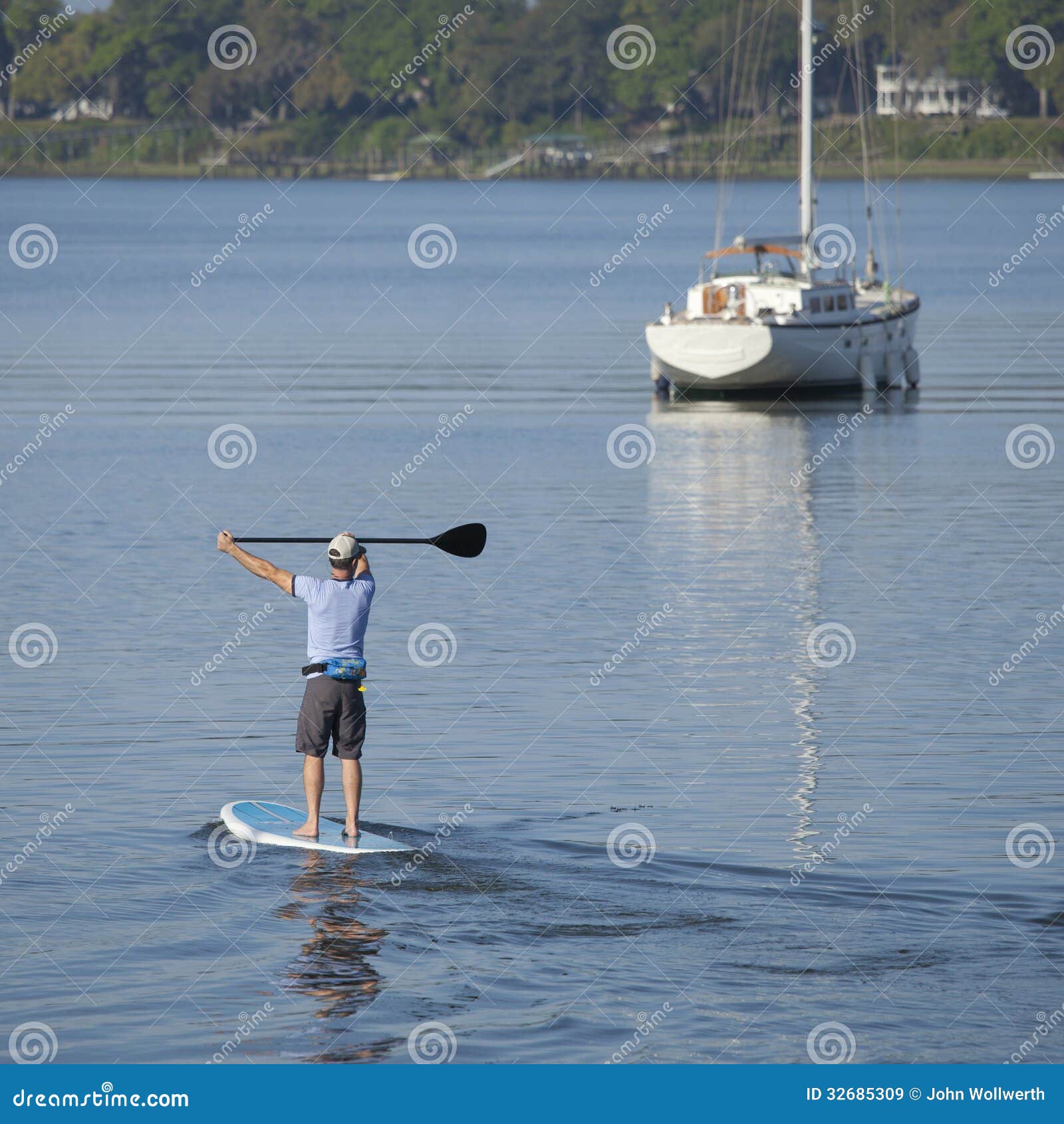 Man paddleboarding stock image. Image of relaxation, boarding - 32685309