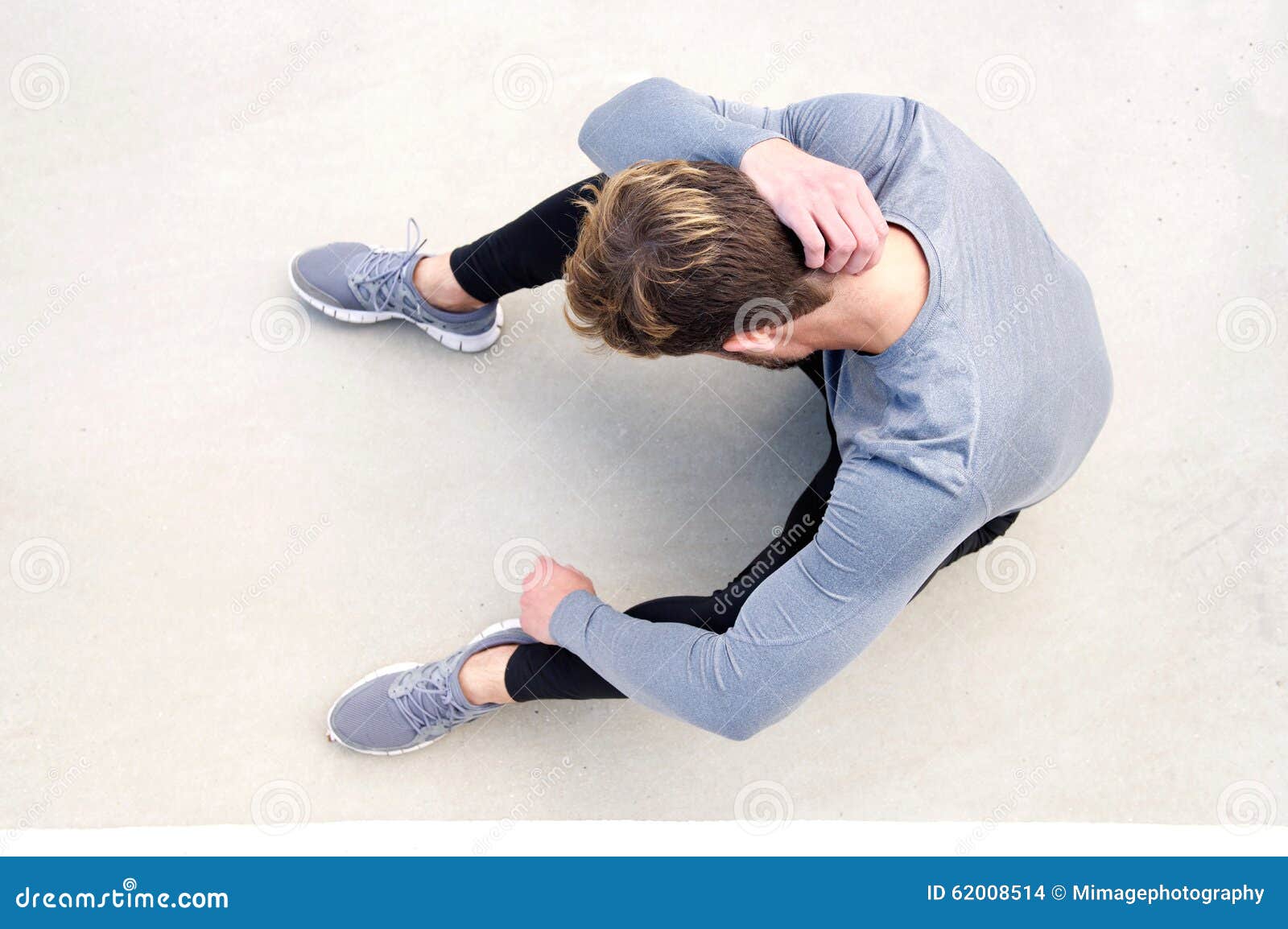 Man in pain after workout stock photo. Image of clothing - 62008514