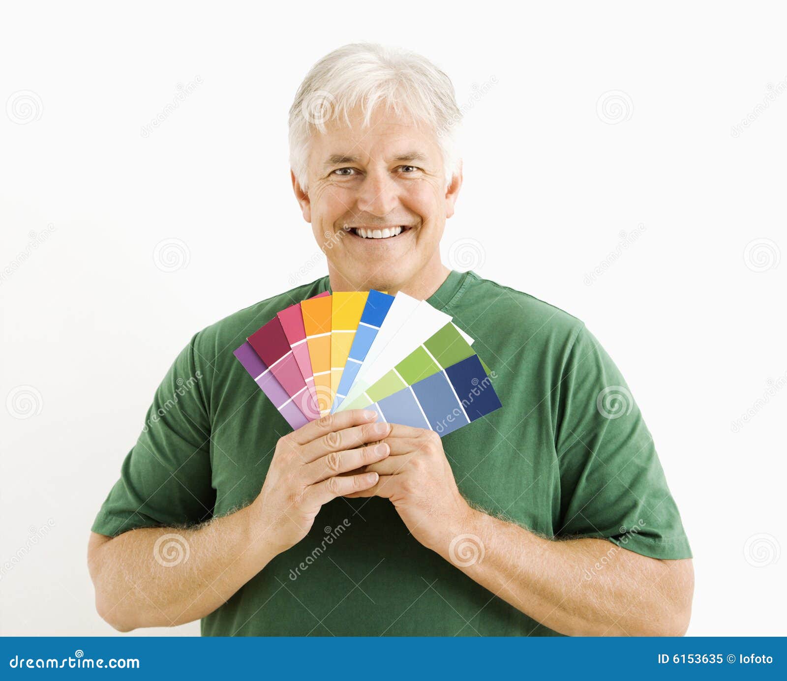 Man with paint swatches. stock image. Image of looking - 6153635