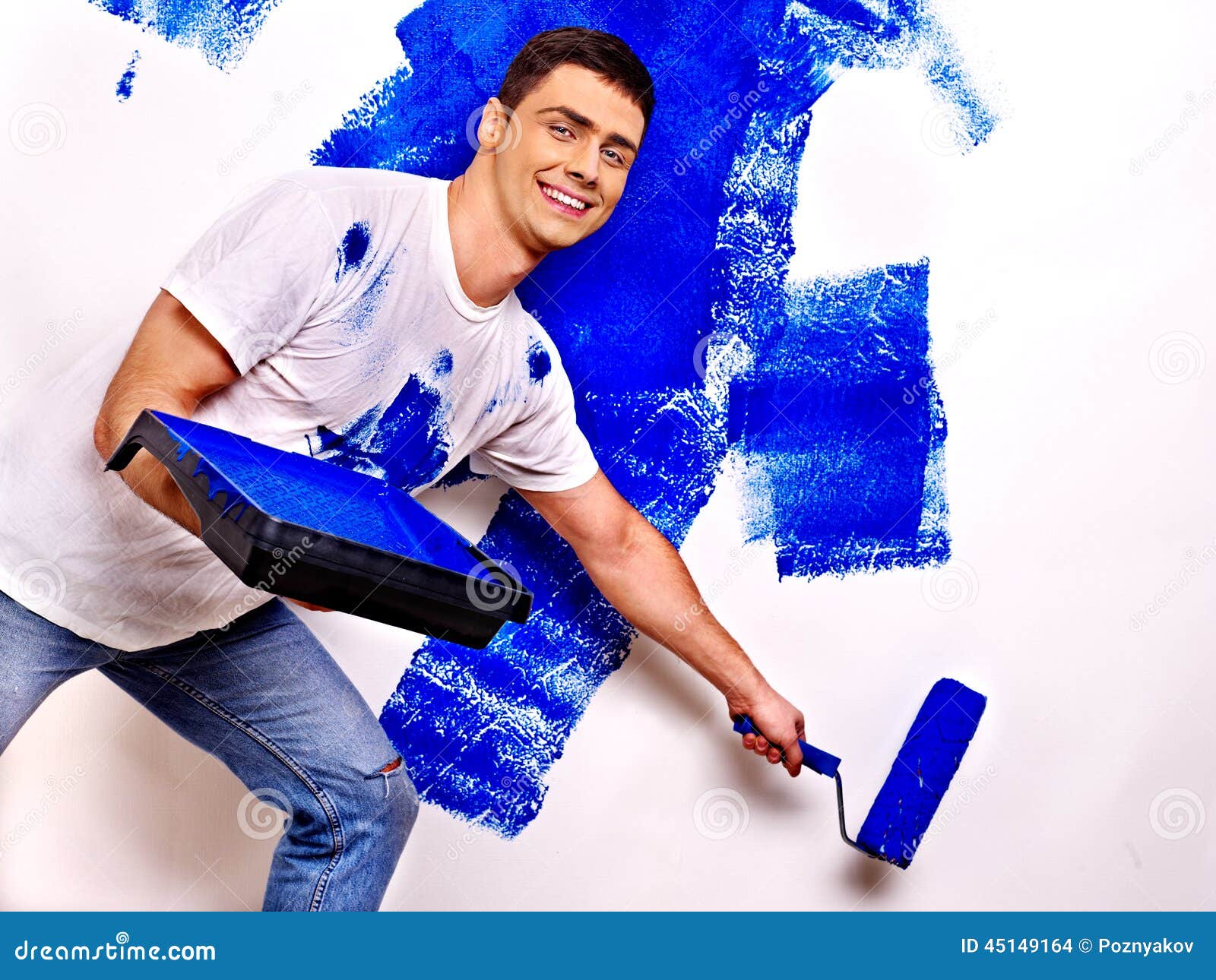 Man paint wall at home. stock photo. Image of interior - 45149164