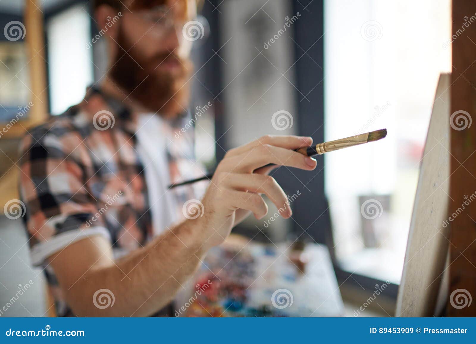 Man with paintbrush stock image. Image of easel, creative - 89453909