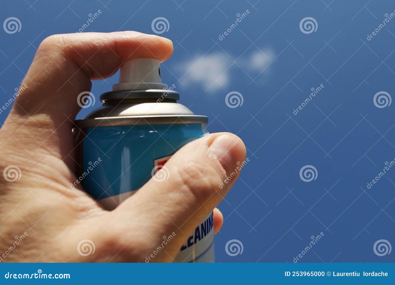 Man Painting with Spray Clouds on Sky Background Stock Photo - Image of ...