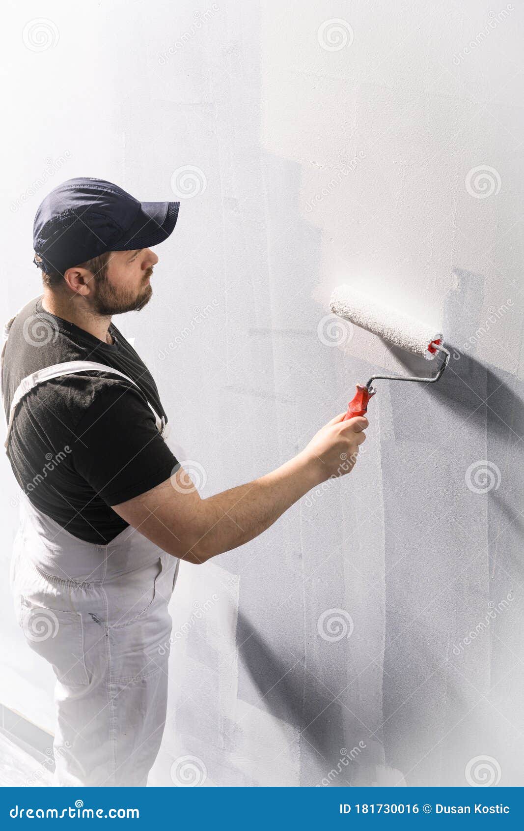 Man Painting a Wall in White Color Stock Photo - Image of decorator ...