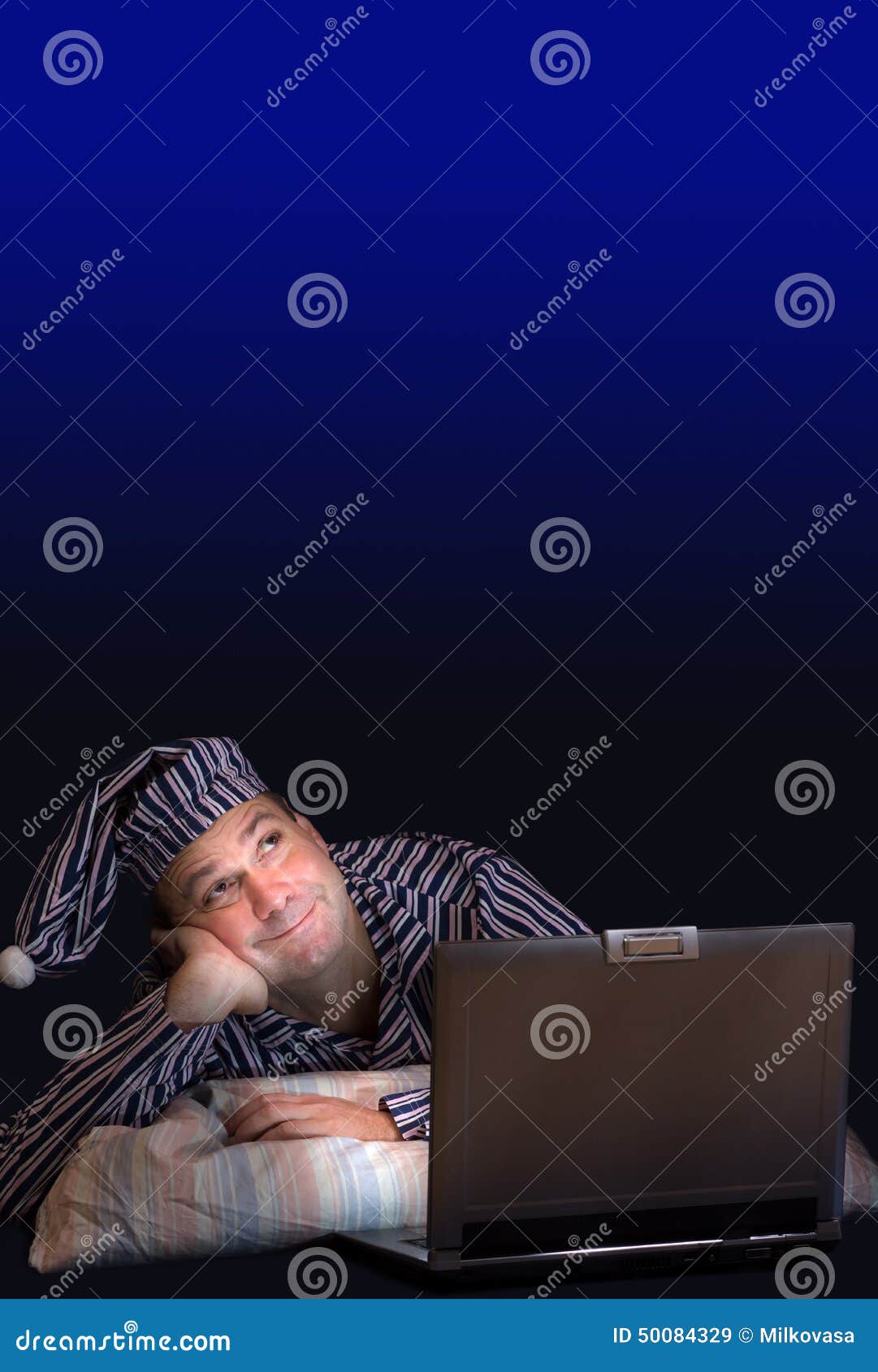 Man in Pajamas Lying in Bed with Computer Stock Image - Image of adult ...