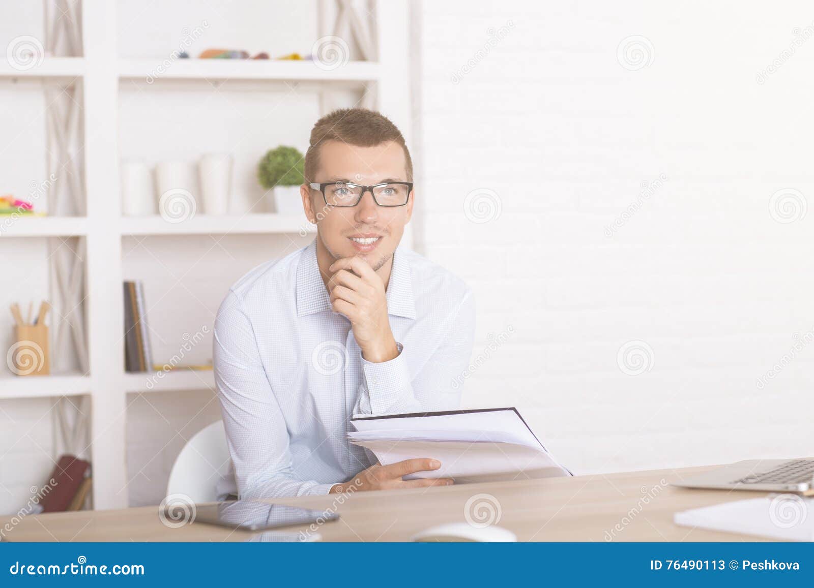 Man with Paperwork Thinking Stock Image - Image of office, interior ...