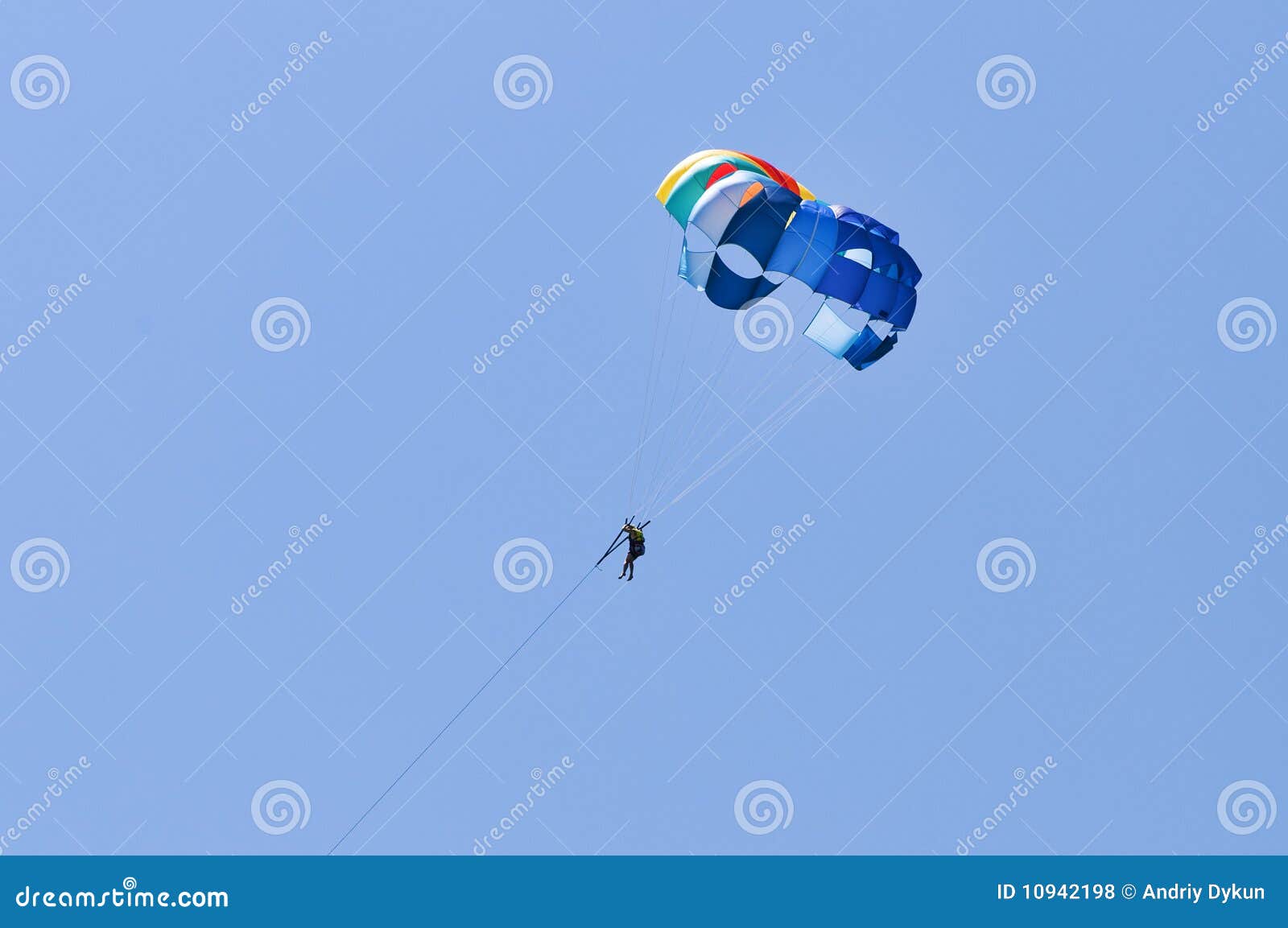 Man with parachute stock photo. Image of diving, blue - 10942198