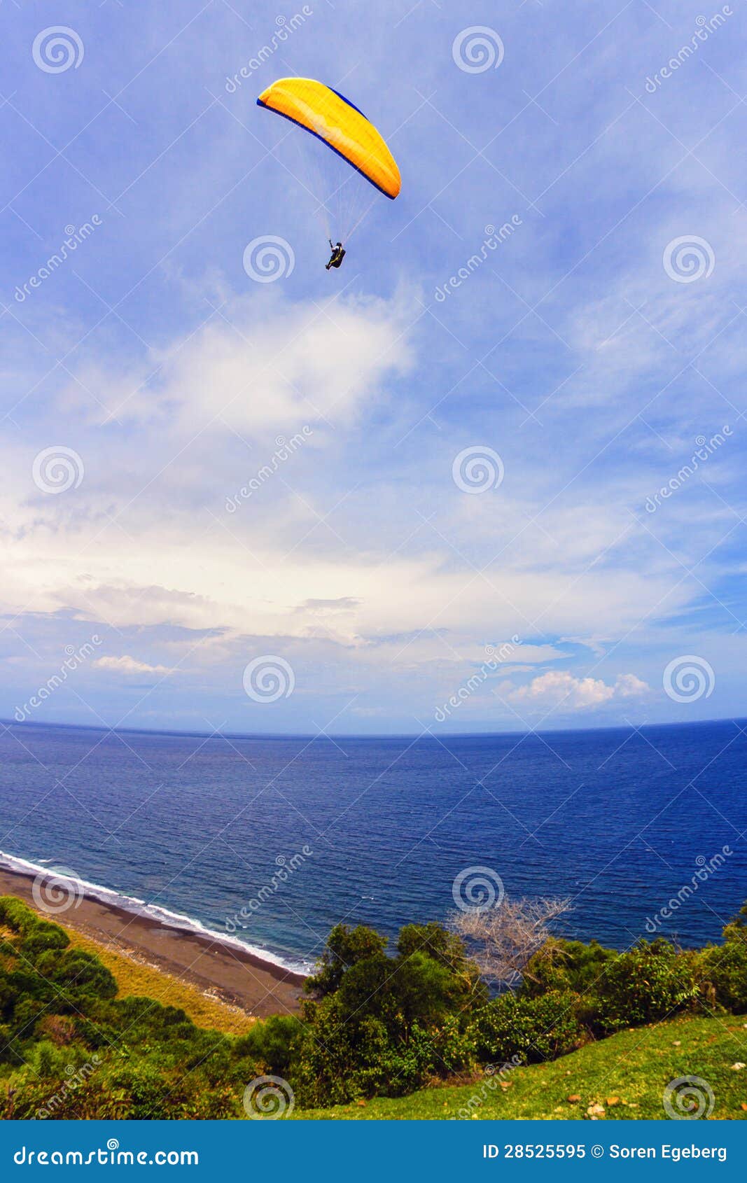 Man paragliding in Bal stock image. Image of island, freedom - 28525595