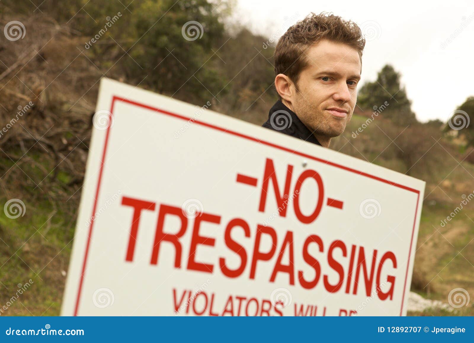 A Man Passing No Trespassing Sign Stock Image - Image of horizontal ...