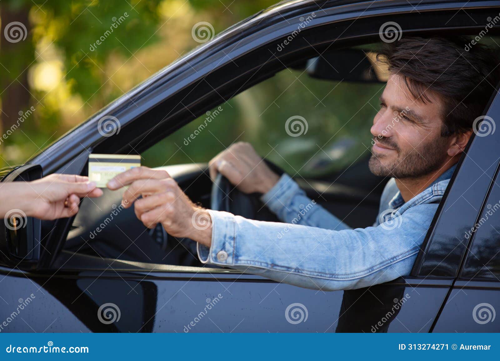 Man Paying with Credit Card while Driving Car Stock Image - Image of ...