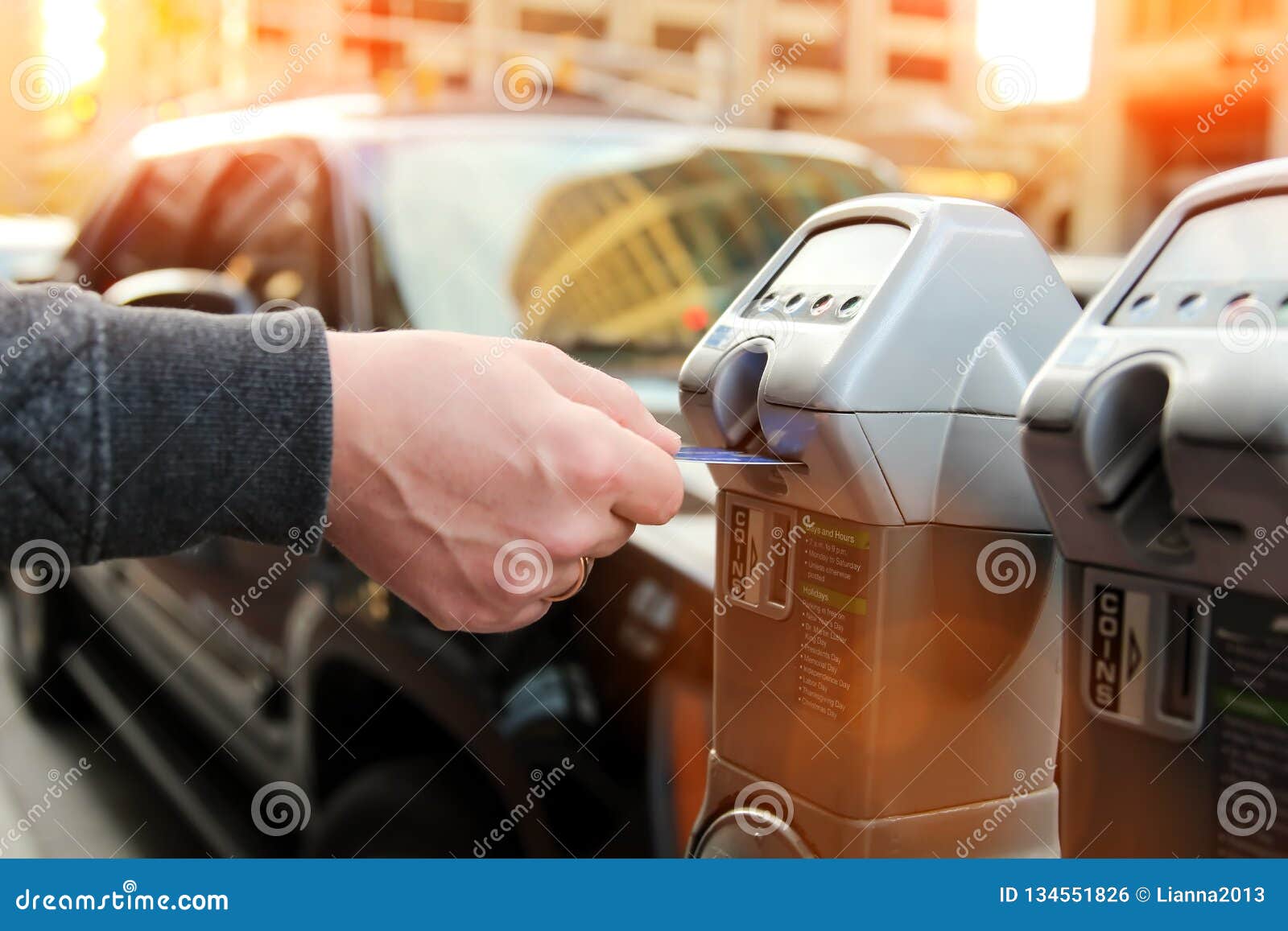 Man is Paying His Parking Using Credit Card at Parking Pay Station ...