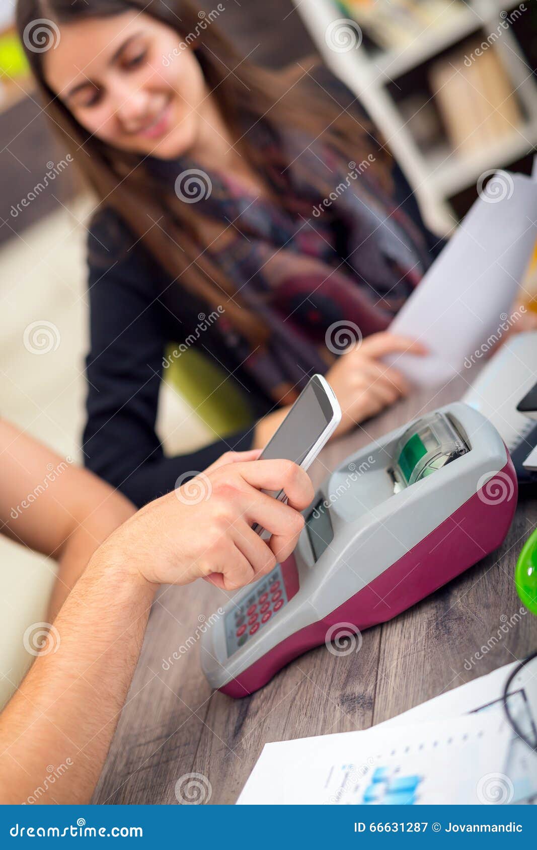 Man Paying by Mobile Phone and Using Reader Holded Stock Image - Image ...