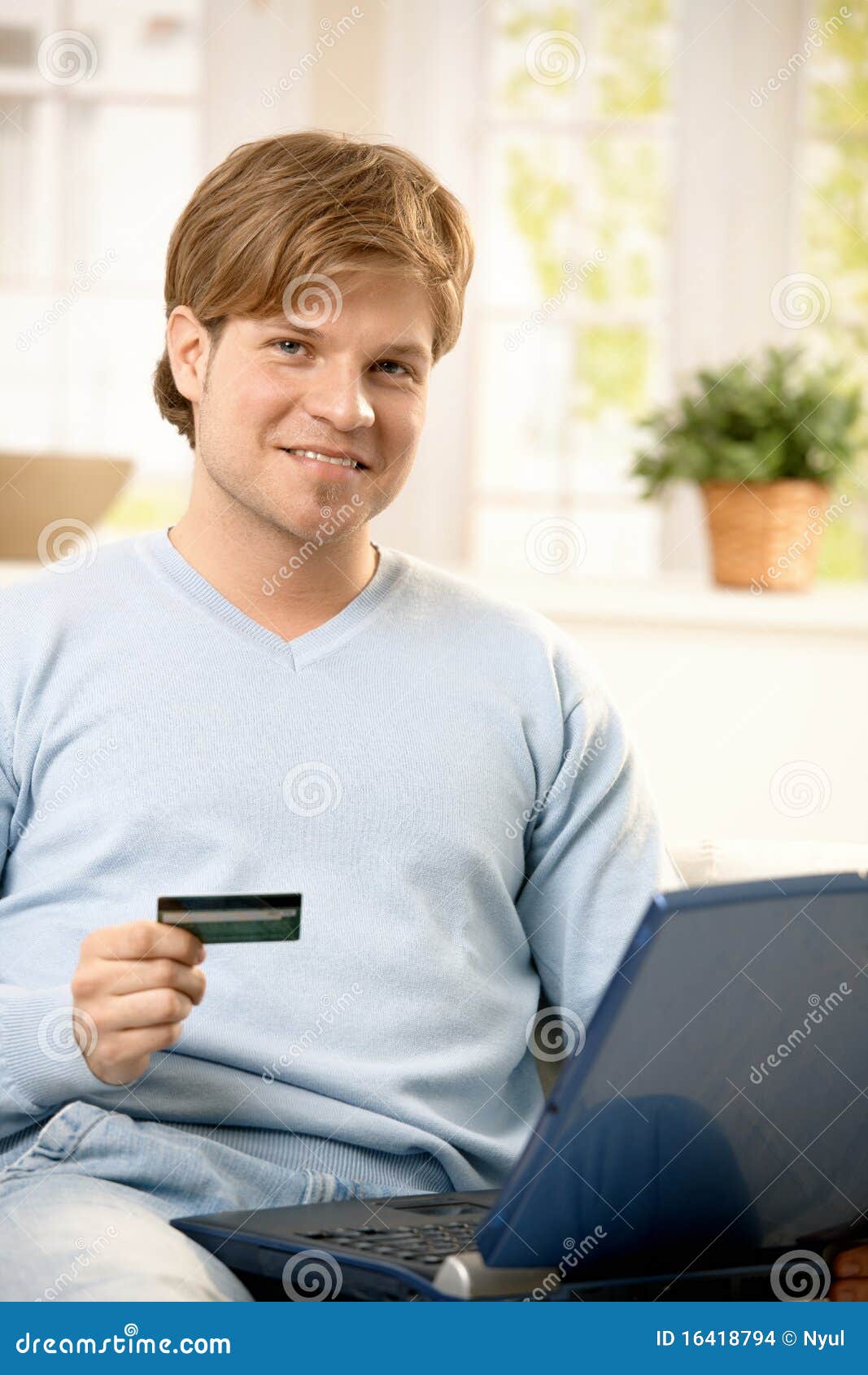 Man paying online stock photo. Image of american, home - 16418794
