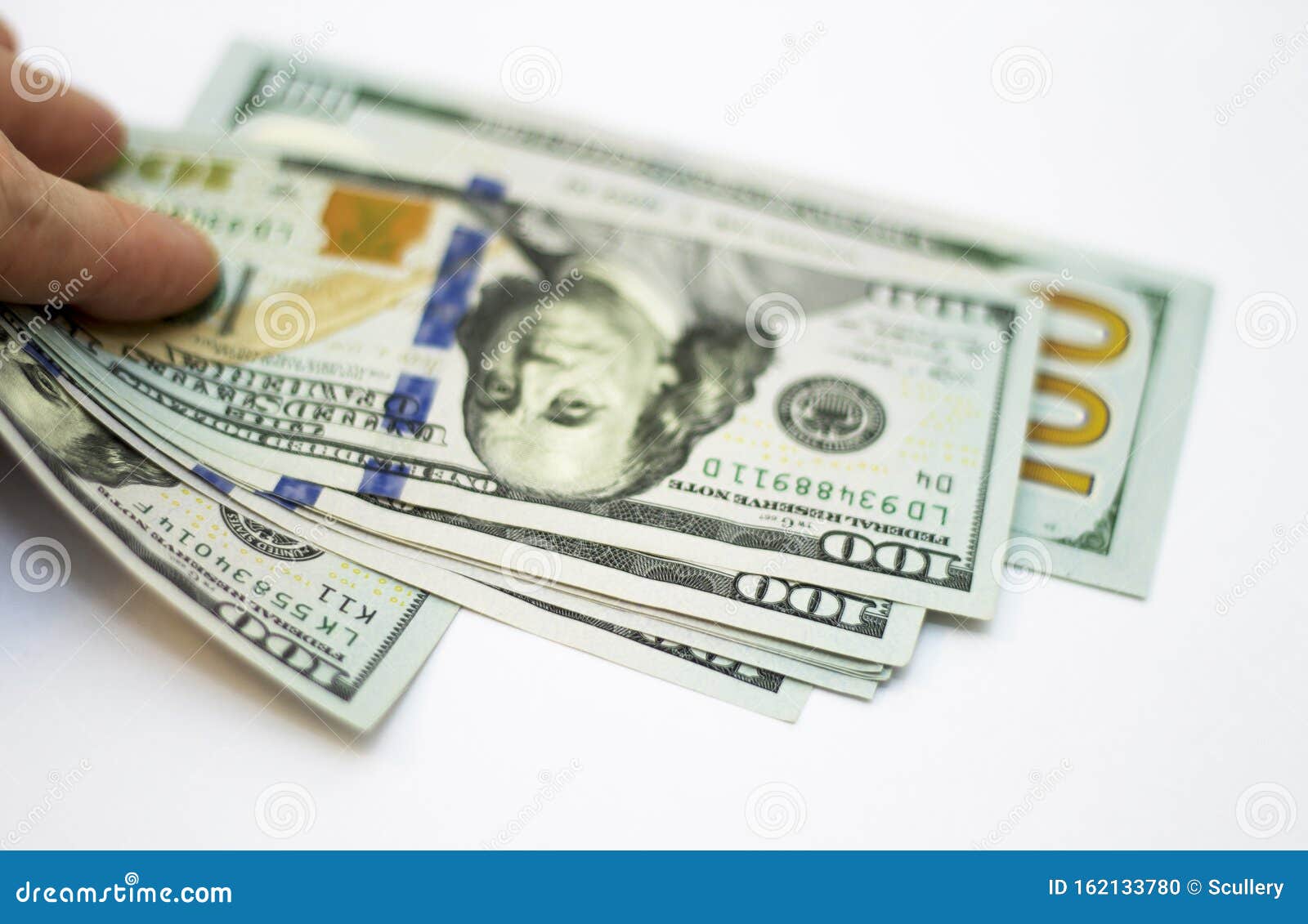 Man Paying by Stack of Paper Dollars Usa on the White Background Stock ...