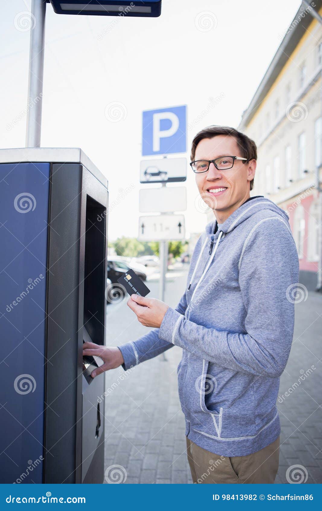 Man pays for parking stock photo. Image of station, card - 98413982