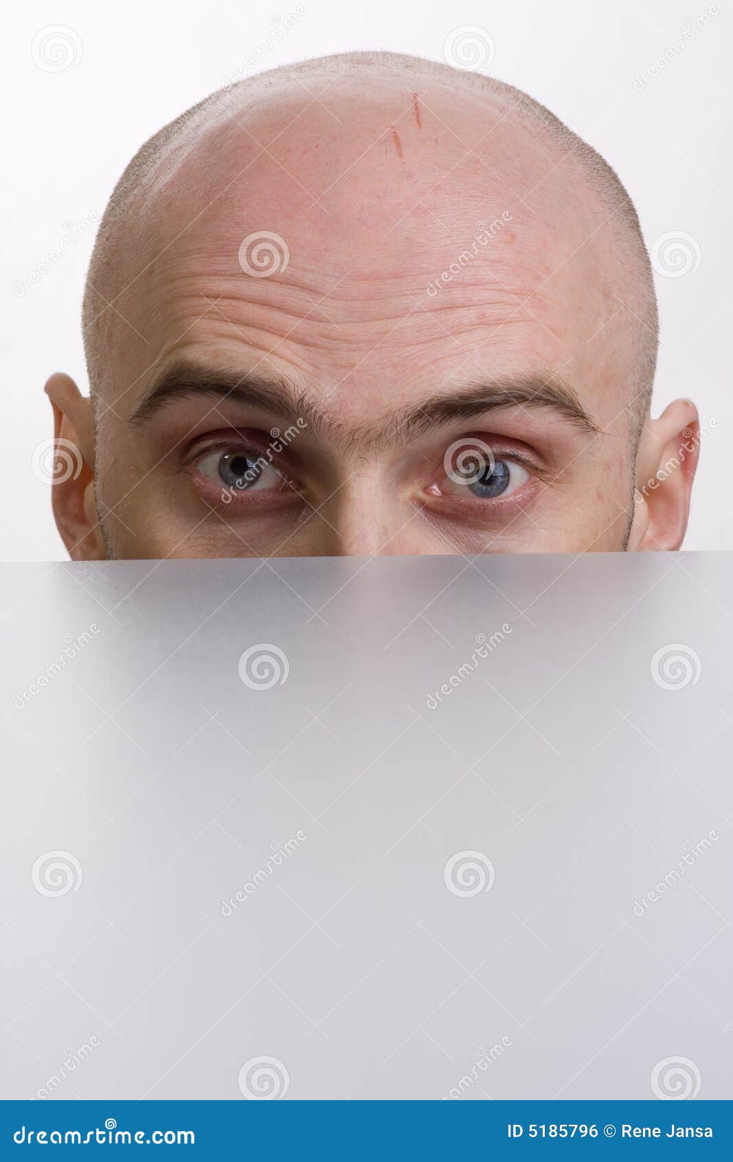 Man peering over a cubicle stock photo. Image of head - 5185796