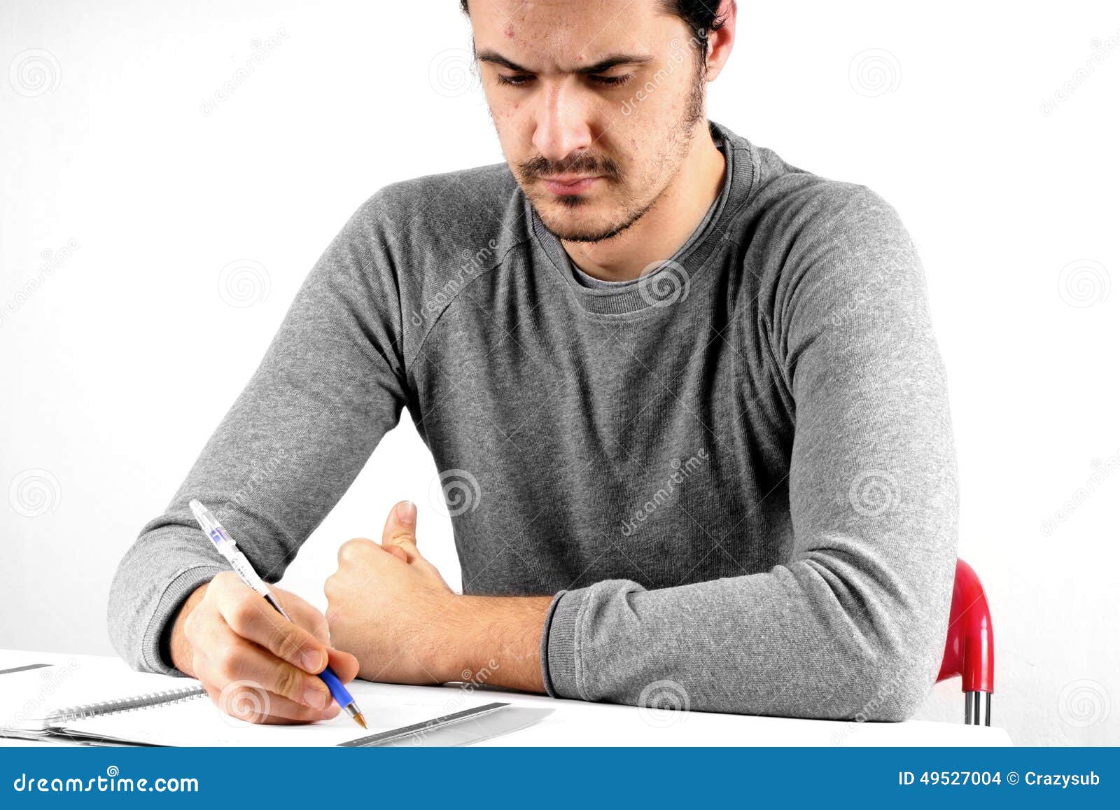 Man with pen stock photo. Image of looking, person, sitting - 49527004