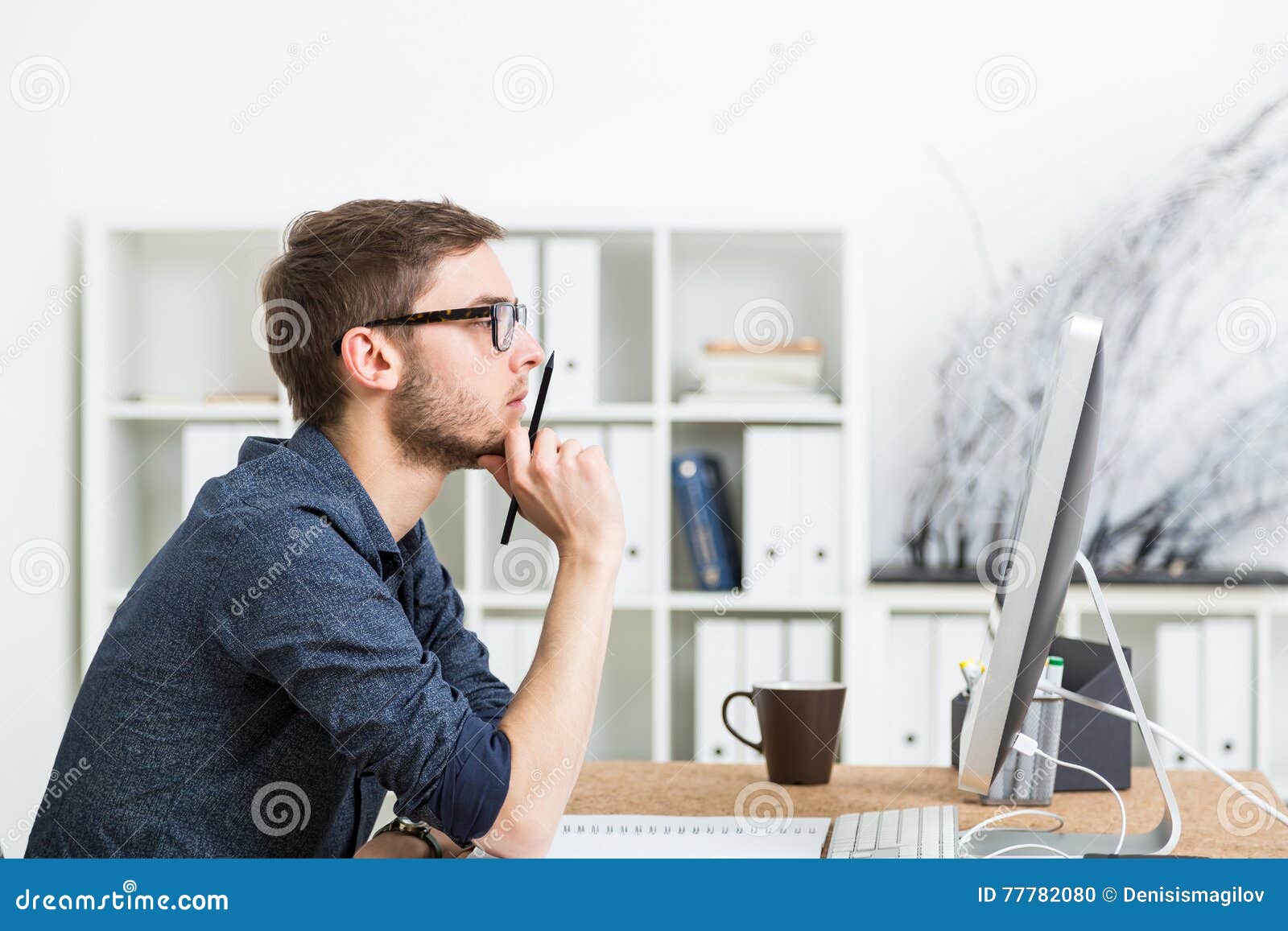 Man with pencil thinking stock photo. Image of casual - 77782080