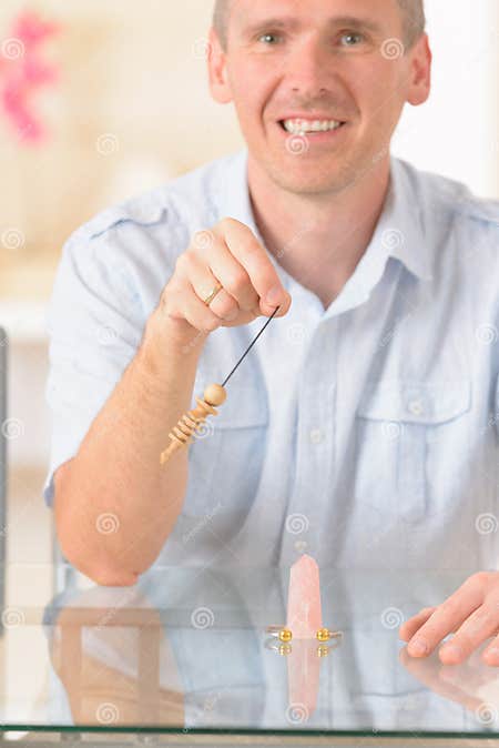 Man with pendulum stock photo. Image of future, dowser - 41619232