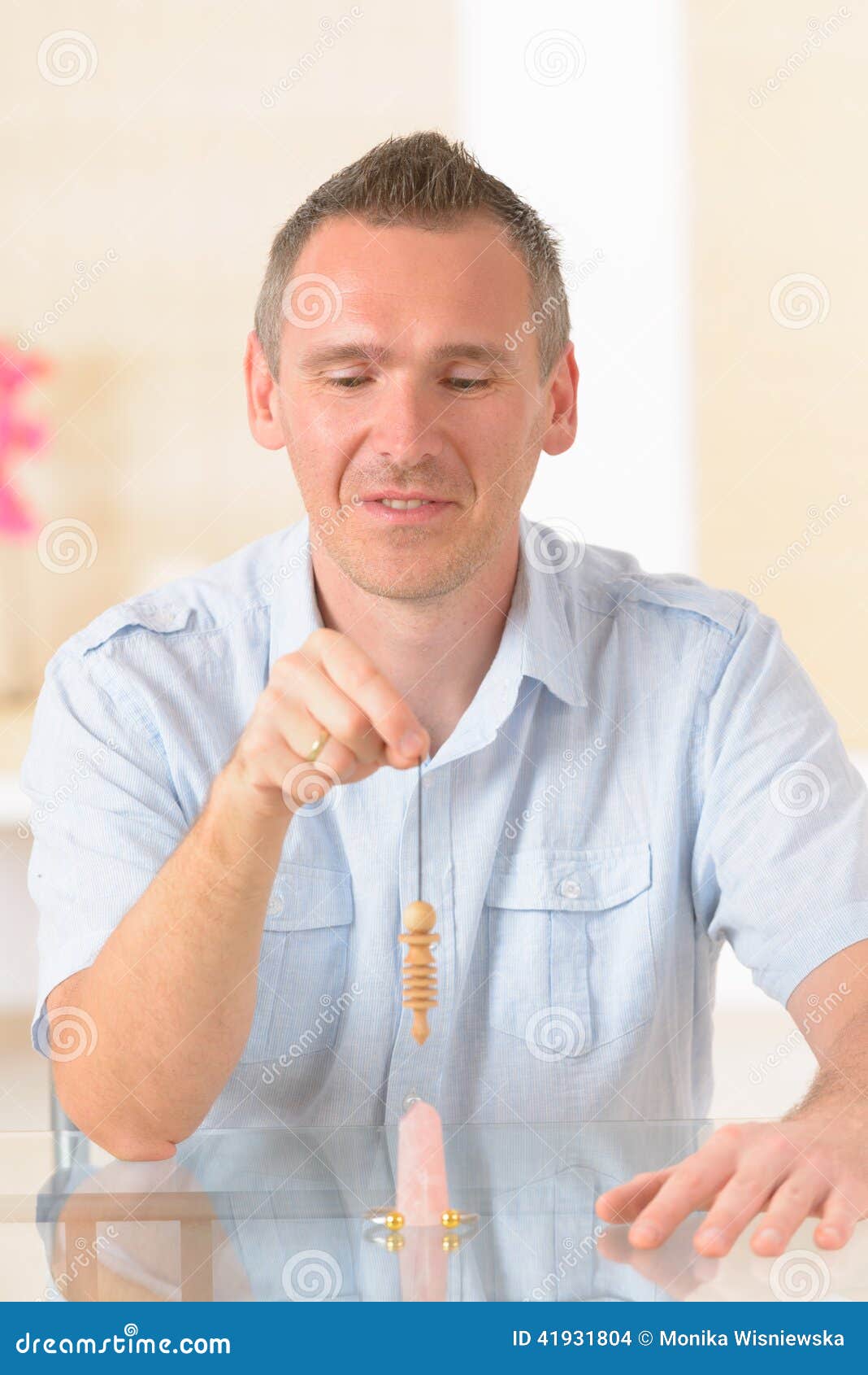 Man with pendulum stock photo. Image of fortunetelling - 41931804