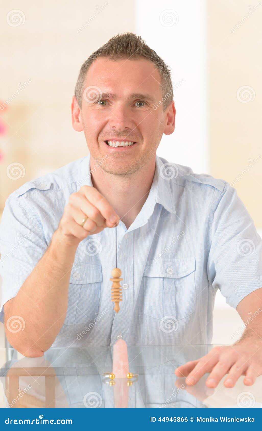 Man with pendulum stock photo. Image of esoteric, magical - 44945866