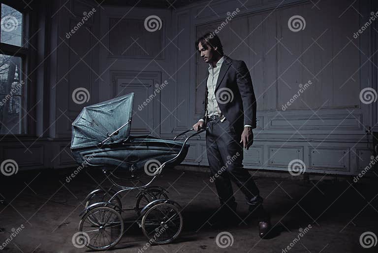 Man with a perambulator stock photo. Image of pram, together - 22836338