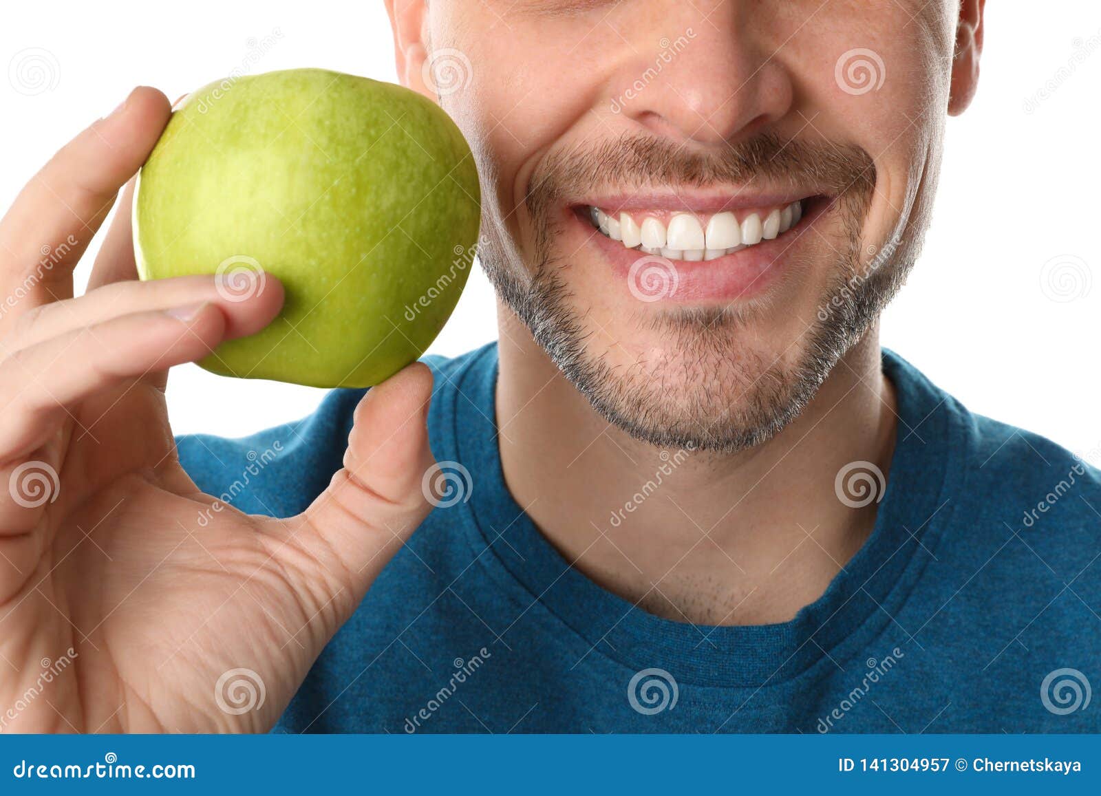 Man with Perfect Teeth and Green Apple on White Background Stock Image ...
