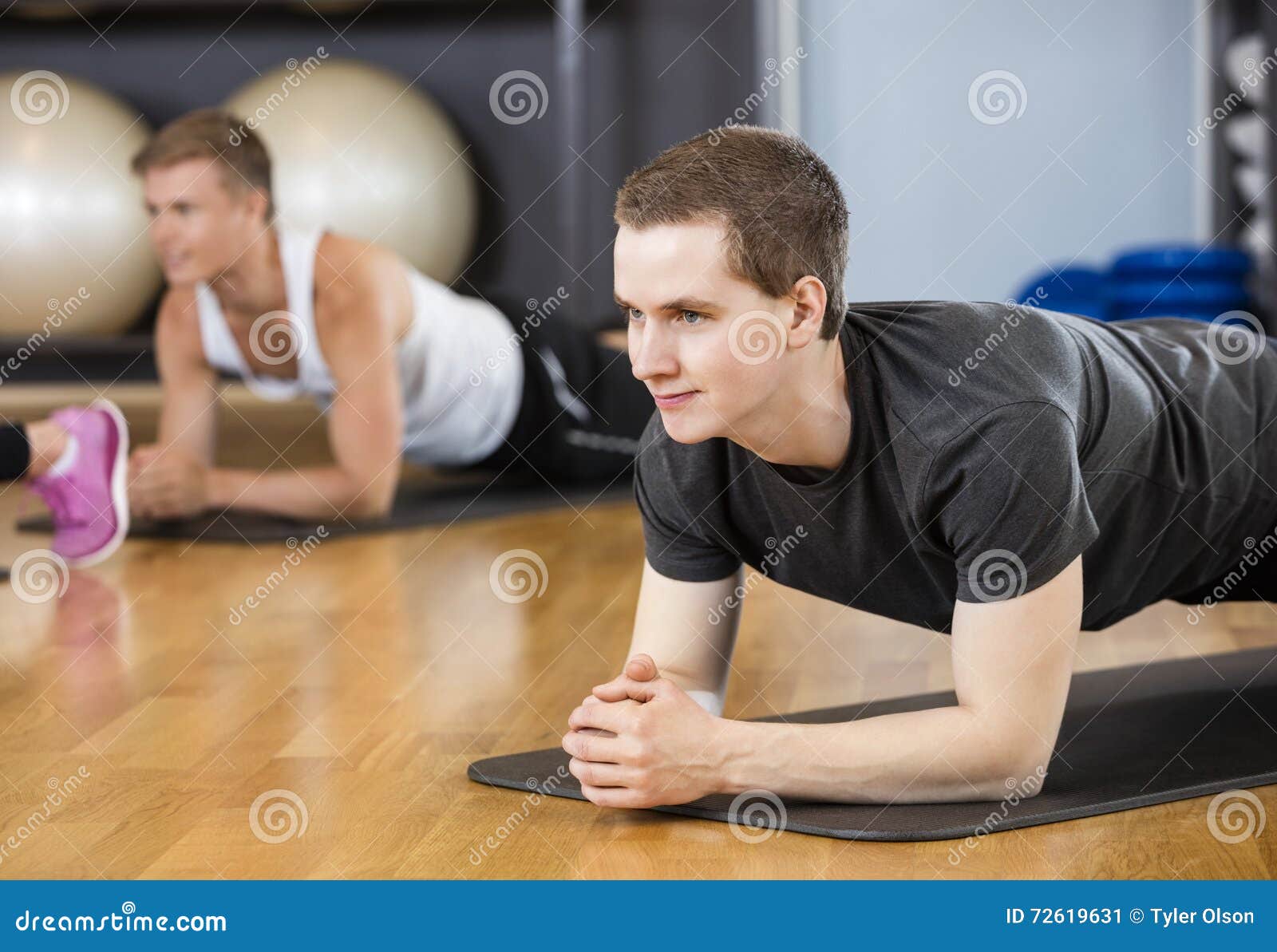 Man Performing Plank Position in Gym Stock Image - Image of plank ...