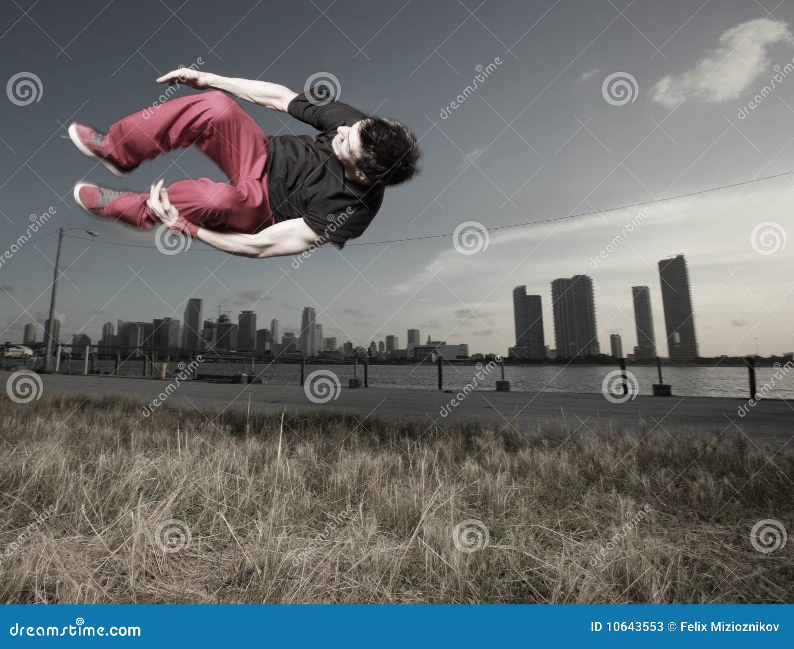 Man Performing a Sideways Flip Stock Image - Image of pants, movement ...