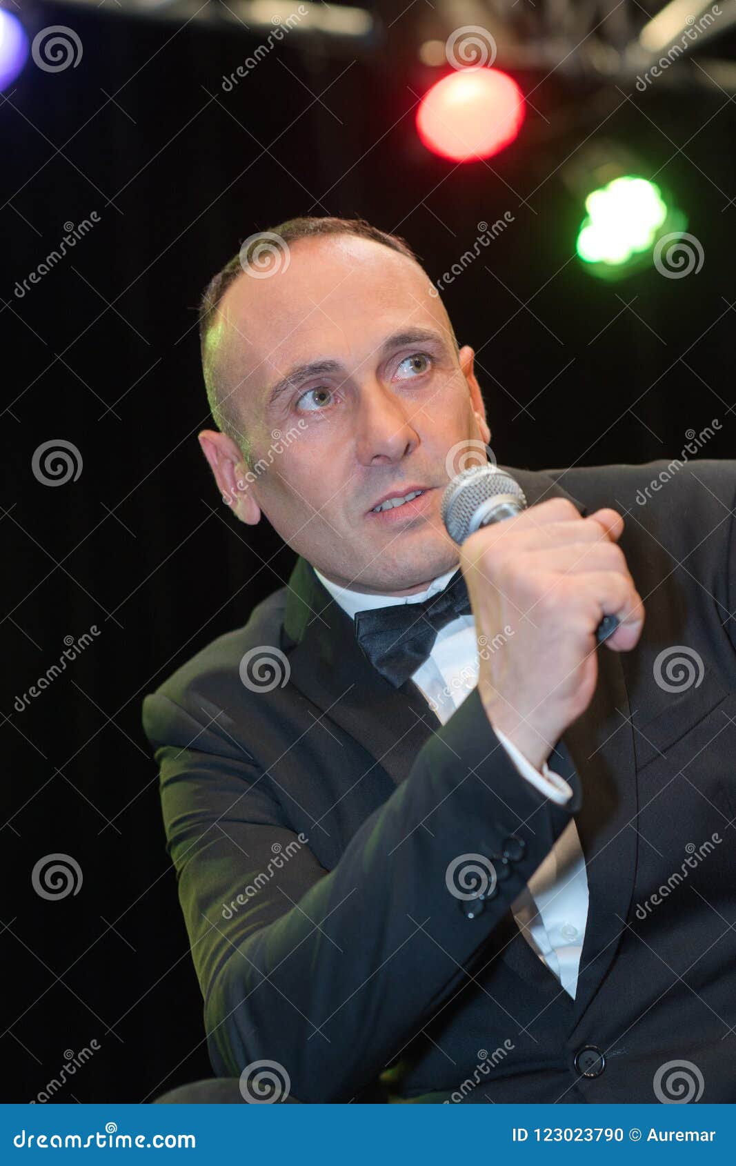 Man Performing on Stage with Microphone Stock Photo - Image of male ...