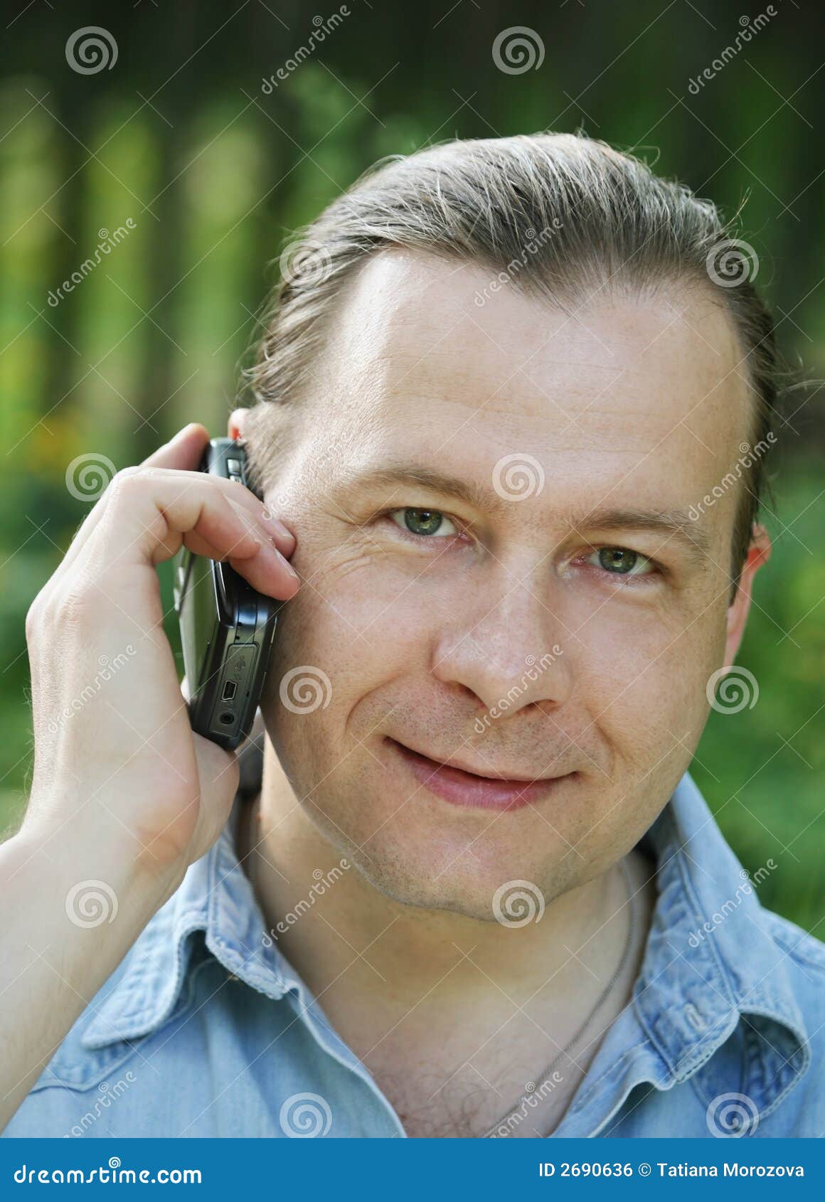 Man with the phone stock photo. Image of handsome, smile - 2690636