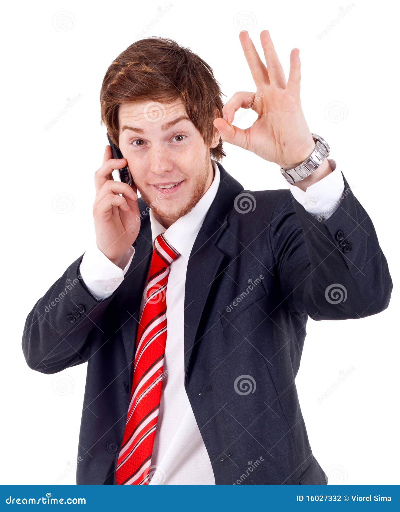Man on the phone approving stock photo. Image of laptop - 16027332