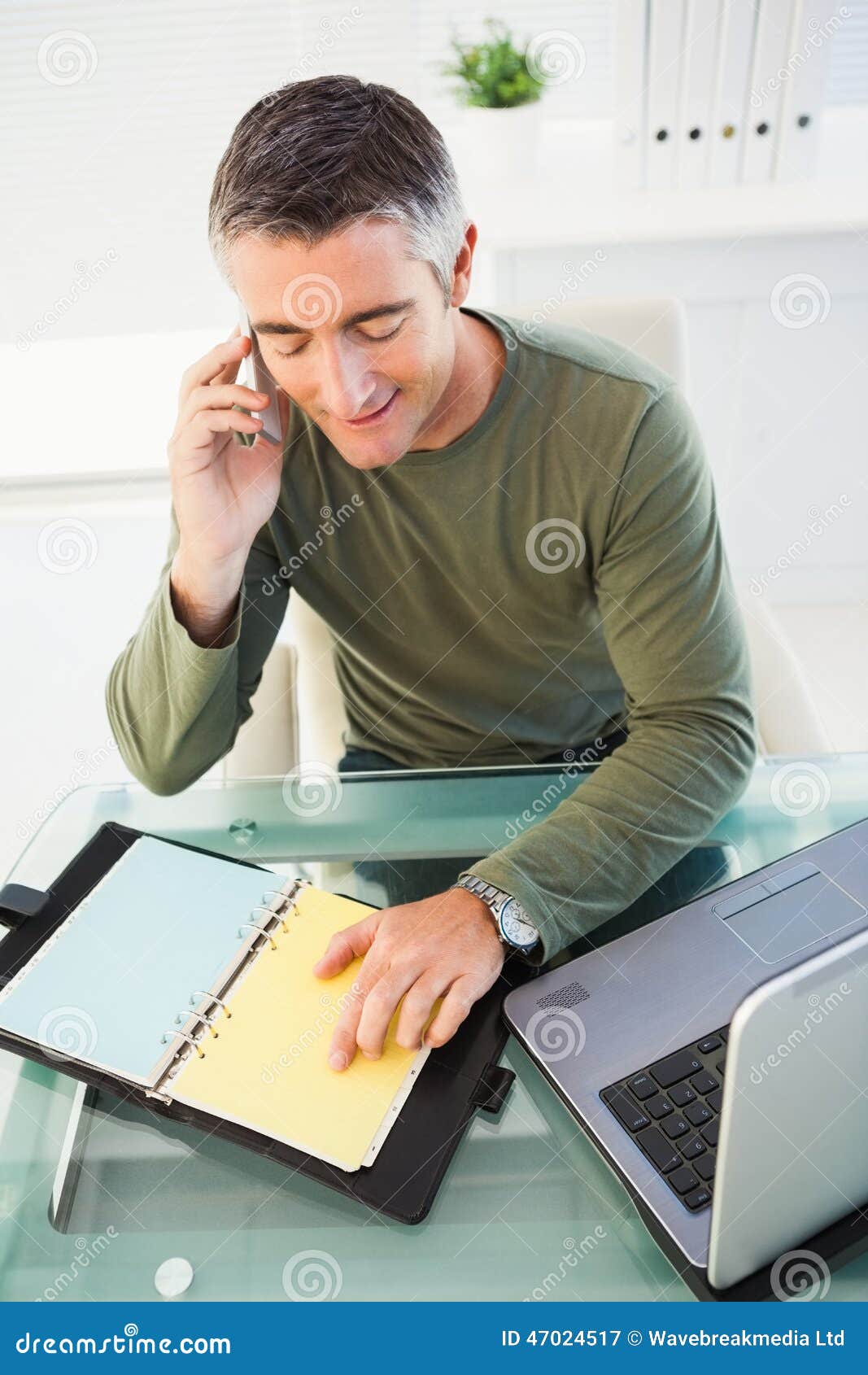 Man on the Phone Checking His Notes Stock Image - Image of computer ...