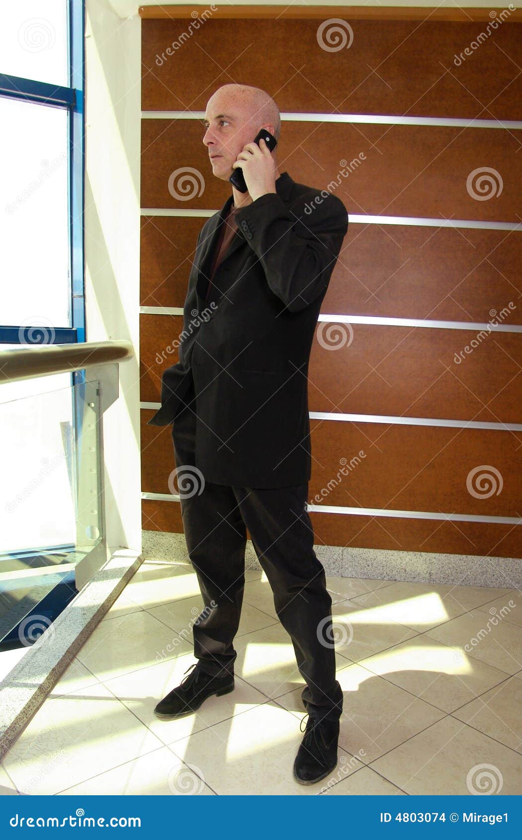 Man on Phone, Standing stock photo. Image of concern, concerned - 4803074