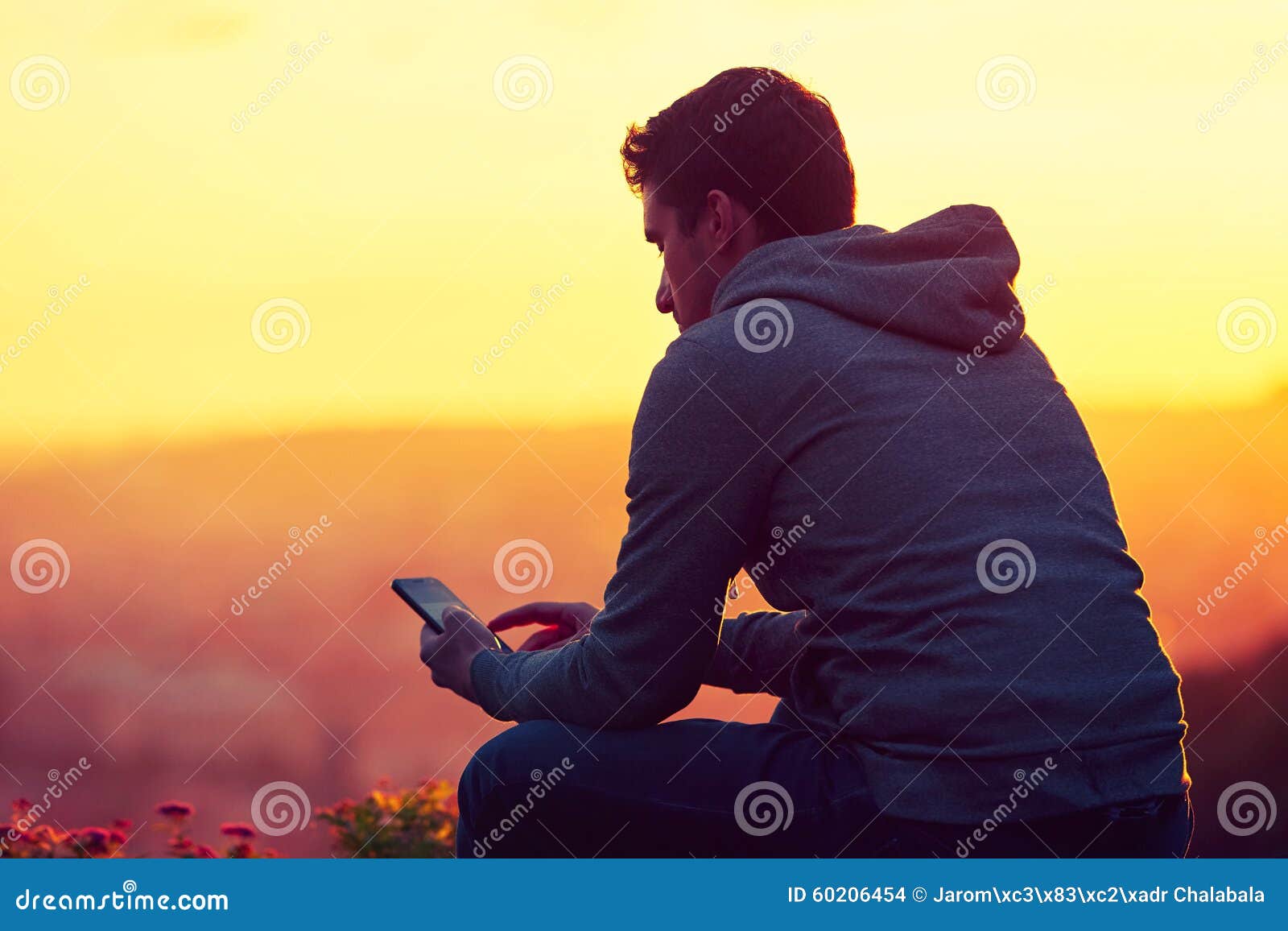 Man with phone stock photo. Image of loneliness, dusk - 60206454